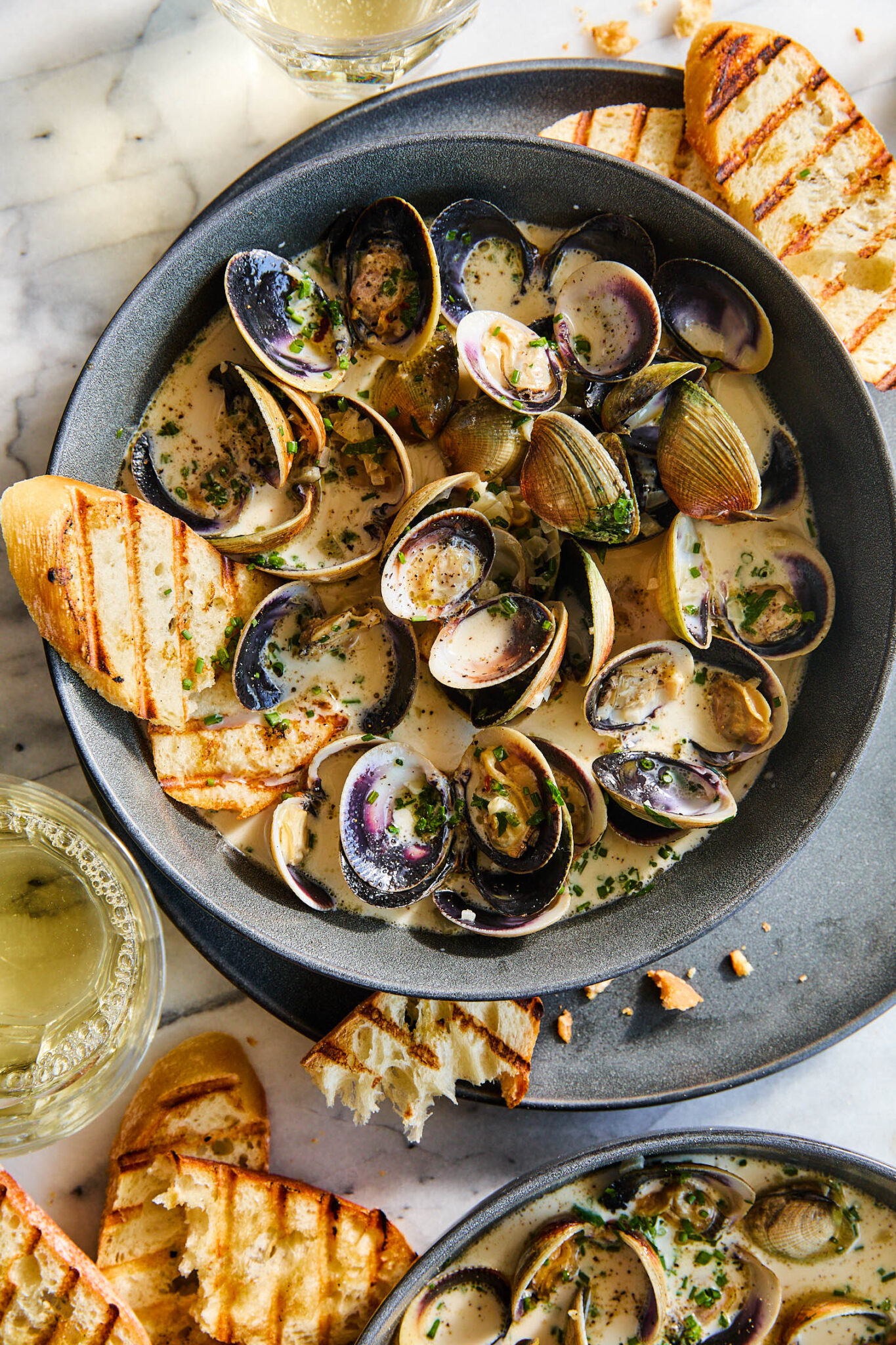 Garlic Butter Clams with White Wine Cream Sauce - Damn Delicious